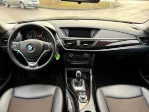 Black BMW X1 2013 in Riga, with an engine capacity of 2.00 L and mileage of 181 thousand km for 9499 €, photo 13 on AUTOMOTO.COM.LV