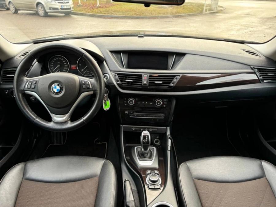 Black BMW X1 2013 in Riga, with an engine capacity of 2.00 L and mileage of 181 thousand km for 9499 €, photo 13 on AUTOMOTO.COM.LV
