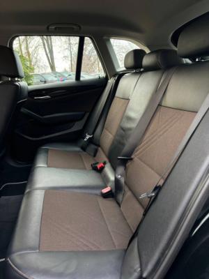 Black BMW X1 2013 in Riga, with an engine capacity of 2.00 L and mileage of 181 thousand km for 9499 €, photo 17 on AUTOMOTO.COM.LV