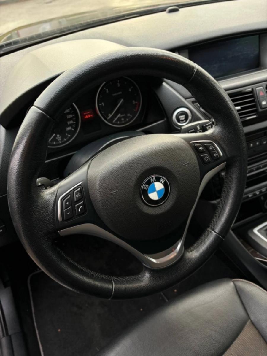 Black BMW X1 2013 in Riga, with an engine capacity of 2.00 L and mileage of 181 thousand km for 9499 €, photo 20 on AUTOMOTO.COM.LV