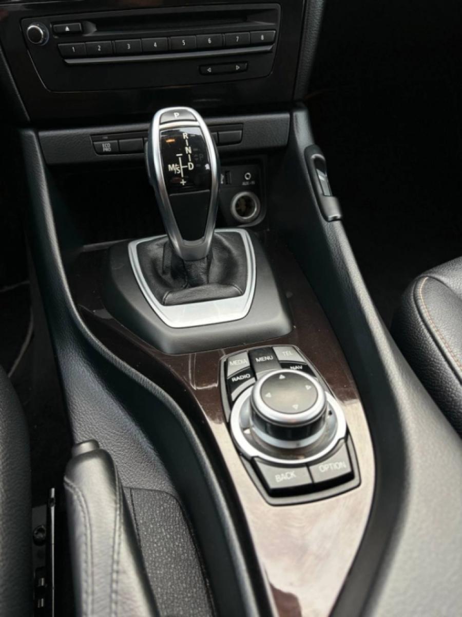 Black BMW X1 2013 in Riga, with an engine capacity of 2.00 L and mileage of 181 thousand km for 9499 €, photo 24 on AUTOMOTO.COM.LV