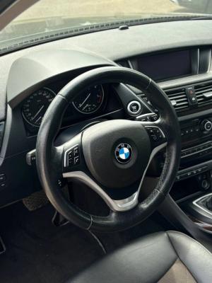 Black BMW X1 2013 in Riga, with an engine capacity of 2.00 L and mileage of 181 thousand km for 9499 €, photo 25 on AUTOMOTO.COM.LV