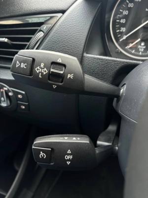 Black BMW X1 2013 in Riga, with an engine capacity of 2.00 L and mileage of 181 thousand km for 9499 €, photo 34 on AUTOMOTO.COM.LV