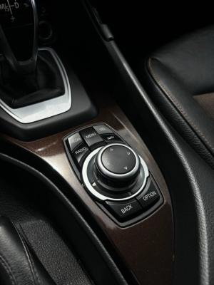 Black BMW X1 2013 in Riga, with an engine capacity of 2.00 L and mileage of 181 thousand km for 9499 €, photo 39 on AUTOMOTO.COM.LV