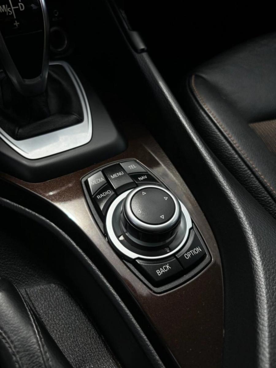 Black BMW X1 2013 in Riga, with an engine capacity of 2.00 L and mileage of 181 thousand km for 9499 €, photo 39 on AUTOMOTO.COM.LV