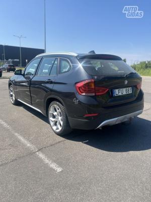 Black BMW X1 2013 in Vilnius, with an engine capacity of 2.00 L and mileage of 268 thousand km for 9500 €, photo 4 on AUTOMOTO.COM.LV