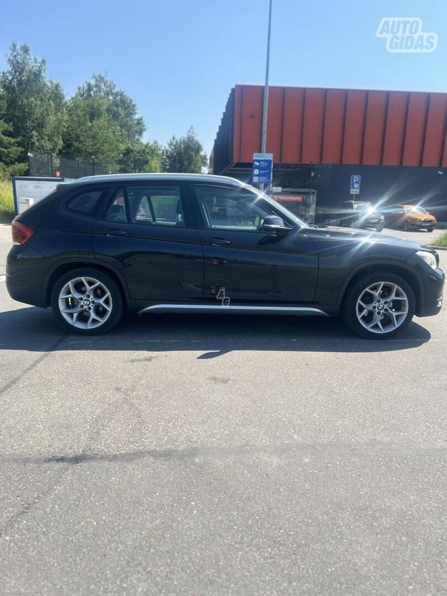 Black BMW X1 2013 in Vilnius, with an engine capacity of 2.00 L and mileage of 268 thousand km for 9500 €, photo 6 on AUTOMOTO.COM.LV