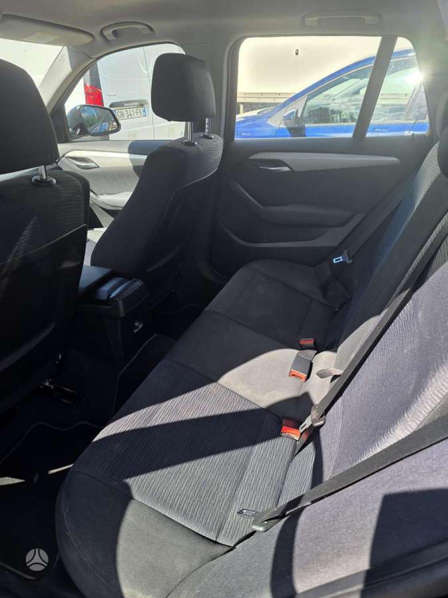 Black BMW X1 2013 in Taurage, with an engine capacity of 2.00 L and mileage of 233 thousand km for 5900 €, photo 12 on AUTOMOTO.COM.LV