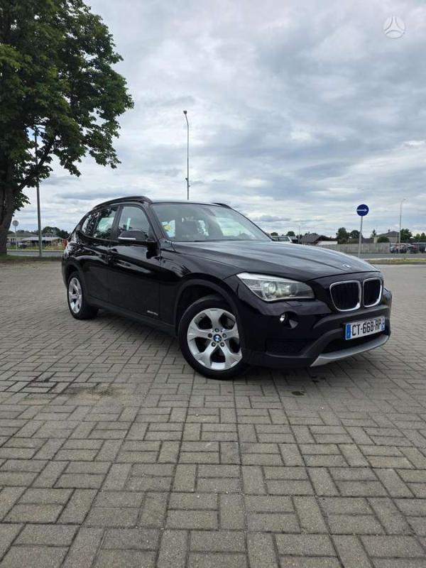 Black BMW X1 2013 in Taurage, with an engine capacity of 2.00 L and mileage of 233 thousand km for 7150 €, photo 1 on AUTOMOTO.COM.LV