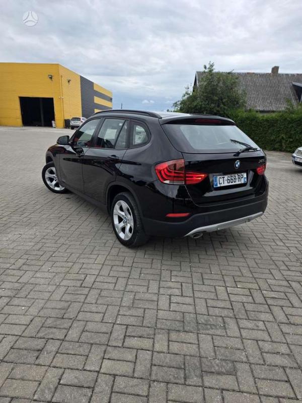 Black BMW X1 2013 in Taurage, with an engine capacity of 2.00 L and mileage of 233 thousand km for 7150 €, photo 6 on AUTOMOTO.COM.LV