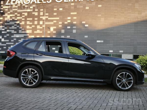 Black BMW X1 2013 in Jelgava, with an engine capacity of 2.00 L and mileage of 0 thousand km for 9990 €, photo 6 on AUTOMOTO.COM.LV