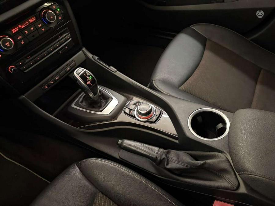 Black BMW X1 2013 in Marijampole, with an engine capacity of 2.00 L and mileage of 258 thousand km for 8999 €, photo 4 on AUTOMOTO.COM.LV
