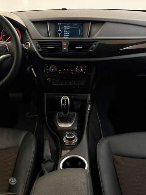 Black BMW X1 2013 in Marijampole, with an engine capacity of 2.00 L and mileage of 258 thousand km for 8999 €, photo 16 on AUTOMOTO.COM.LV