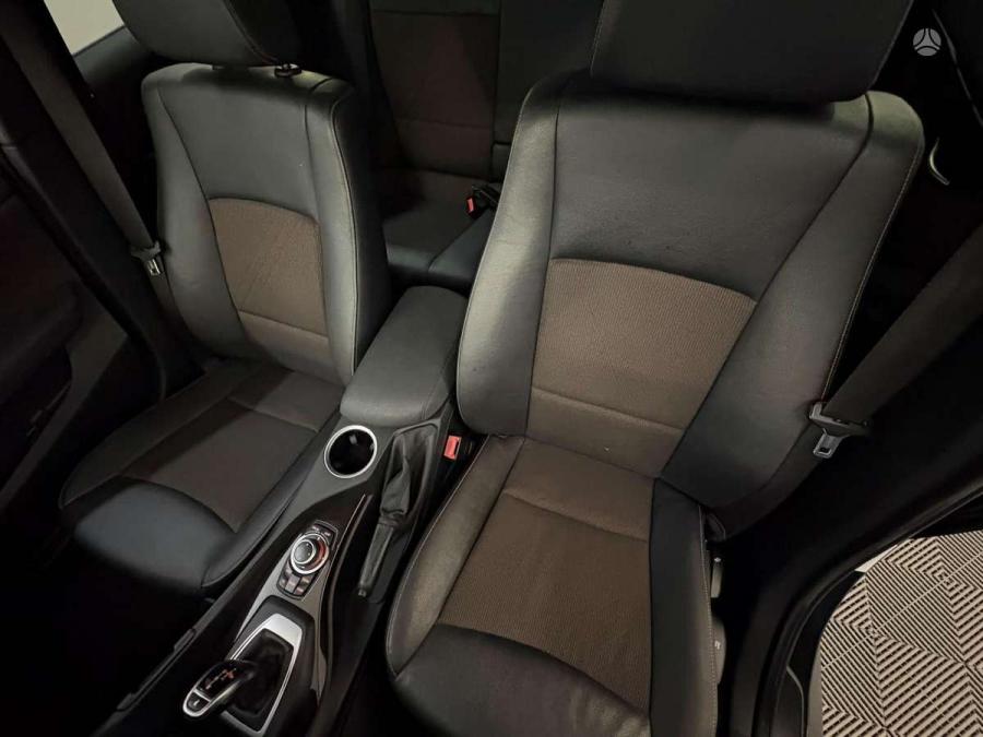 Black BMW X1 2013 in Marijampole, with an engine capacity of 2.00 L and mileage of 258 thousand km for 8999 €, photo 21 on AUTOMOTO.COM.LV
