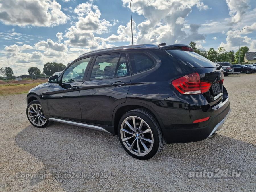 Black BMW X1 2013 in Tartu, with an engine capacity of 2.00 L and mileage of 192 thousand km for 9690 €, photo 7 on AUTOMOTO.COM.LV