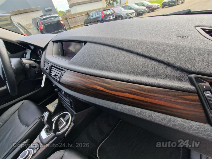 Black BMW X1 2013 in Tartu, with an engine capacity of 2.00 L and mileage of 192 thousand km for 9690 €, photo 20 on AUTOMOTO.COM.LV