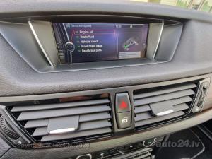 Black BMW X1 2013 in Tartu, with an engine capacity of 2.00 L and mileage of 192 thousand km for 9690 €, photo 22 on AUTOMOTO.COM.LV