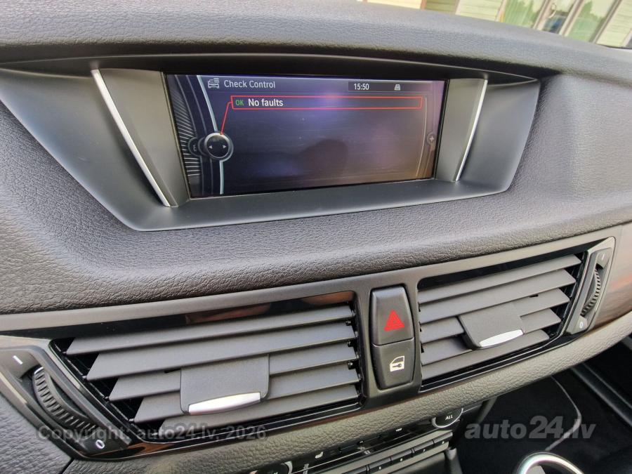 Black BMW X1 2013 in Tartu, with an engine capacity of 2.00 L and mileage of 192 thousand km for 9690 €, photo 23 on AUTOMOTO.COM.LV