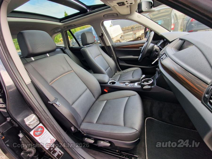 Black BMW X1 2013 in Tartu, with an engine capacity of 2.00 L and mileage of 192 thousand km for 9690 €, photo 26 on AUTOMOTO.COM.LV