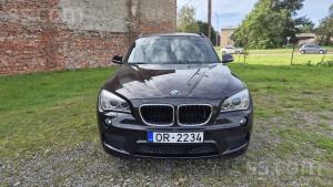 Black BMW X1 2013 in Liepaja, with an engine capacity of 2.00 L and mileage of 230 thousand km for 9850 €, photo 3 on AUTOMOTO.COM.LV