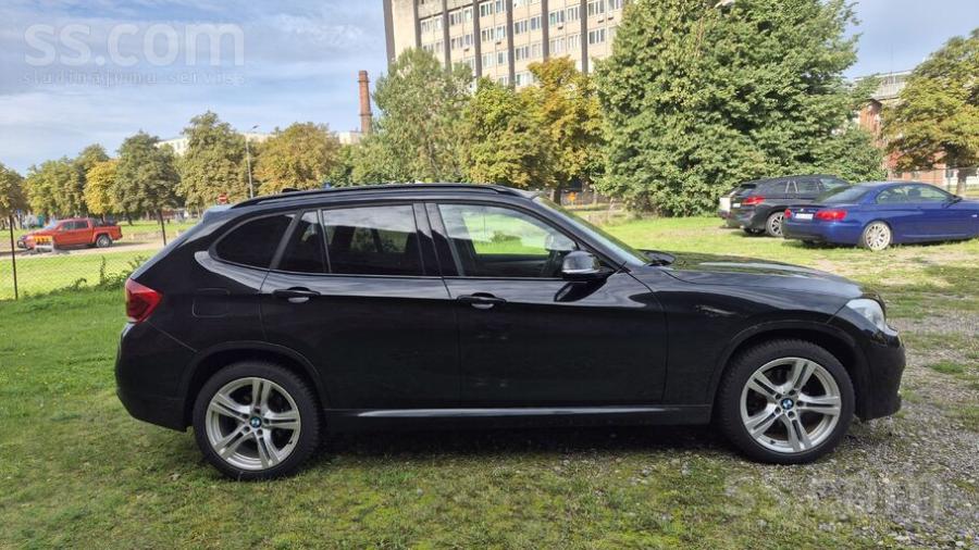 Black BMW X1 2013 in Liepaja, with an engine capacity of 2.00 L and mileage of 230 thousand km for 9850 €, photo 5 on AUTOMOTO.COM.LV