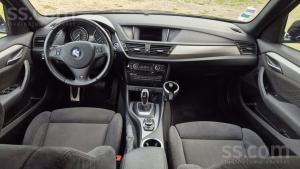 Black BMW X1 2013 in Liepaja, with an engine capacity of 2.00 L and mileage of 230 thousand km for 9850 €, photo 11 on AUTOMOTO.COM.LV