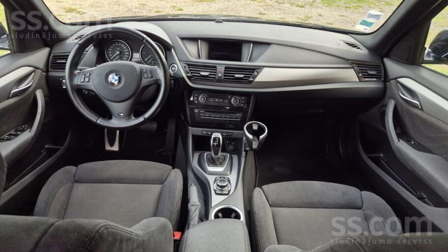Black BMW X1 2013 in Liepaja, with an engine capacity of 2.00 L and mileage of 230 thousand km for 9850 €, photo 11 on AUTOMOTO.COM.LV