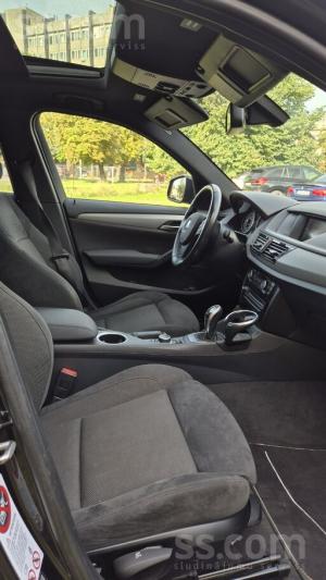 Black BMW X1 2013 in Liepaja, with an engine capacity of 2.00 L and mileage of 230 thousand km for 9850 €, photo 12 on AUTOMOTO.COM.LV