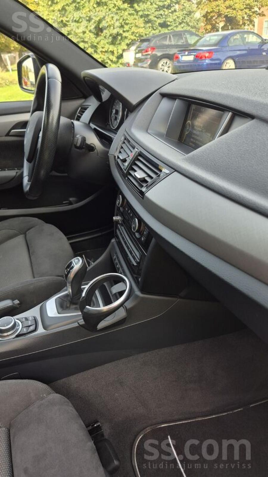 Black BMW X1 2013 in Liepaja, with an engine capacity of 2.00 L and mileage of 230 thousand km for 9850 €, photo 13 on AUTOMOTO.COM.LV
