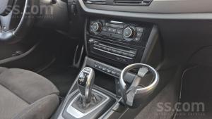 Black BMW X1 2013 in Liepaja, with an engine capacity of 2.00 L and mileage of 230 thousand km for 9850 €, photo 14 on AUTOMOTO.COM.LV