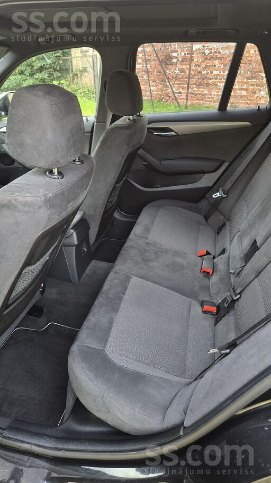 Black BMW X1 2013 in Liepaja, with an engine capacity of 2.00 L and mileage of 230 thousand km for 9850 €, photo 15 on AUTOMOTO.COM.LV