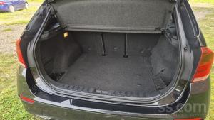 Black BMW X1 2013 in Liepaja, with an engine capacity of 2.00 L and mileage of 230 thousand km for 9850 €, photo 16 on AUTOMOTO.COM.LV
