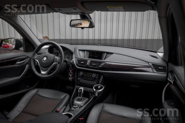 Black BMW X1 2014 in Talsi, with an engine capacity of 2.00 L and mileage of 255 thousand km for 11990 €, photo 8 on AUTOMOTO.COM.LV