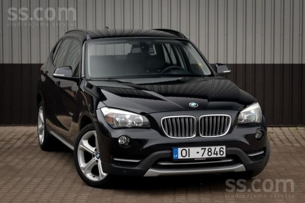 Black BMW X1 2014 in Talsi, with an engine capacity of 2.00 L and mileage of 255 thousand km for 11490 €, photo 1 on AUTOMOTO.COM.LV