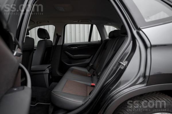 Black BMW X1 2014 in Talsi, with an engine capacity of 2.00 L and mileage of 255 thousand km for 11490 €, photo 10 on AUTOMOTO.COM.LV