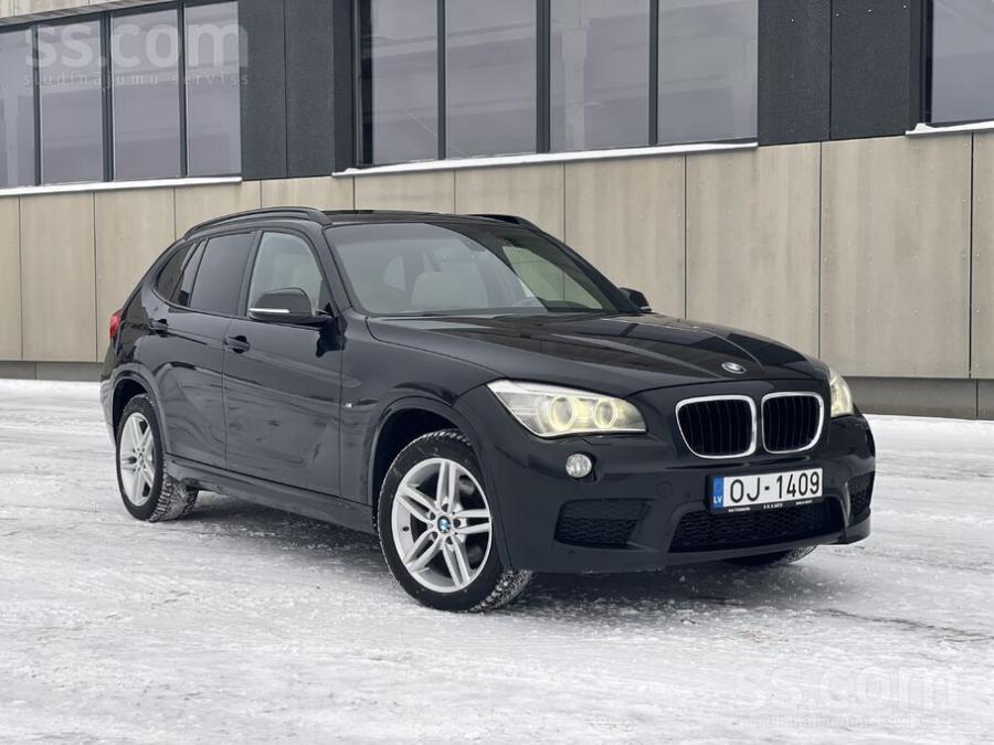 Black BMW X1 2014 in Riga, with an engine capacity of 2.00 L and mileage of 199 thousand km for 12690 €, photo 1 on AUTOMOTO.COM.LV