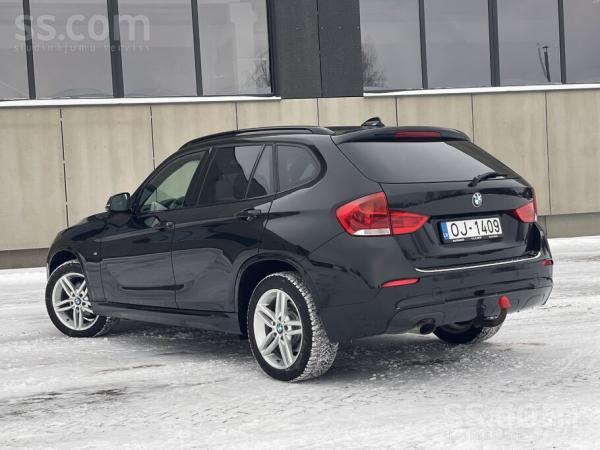 Black BMW X1 2014 in Riga, with an engine capacity of 2.00 L and mileage of 199 thousand km for 12690 €, photo 6 on AUTOMOTO.COM.LV