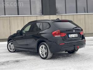 Black BMW X1 2014 in Riga, with an engine capacity of 2.00 L and mileage of 199 thousand km for 12690 €, photo 6 on AUTOMOTO.COM.LV
