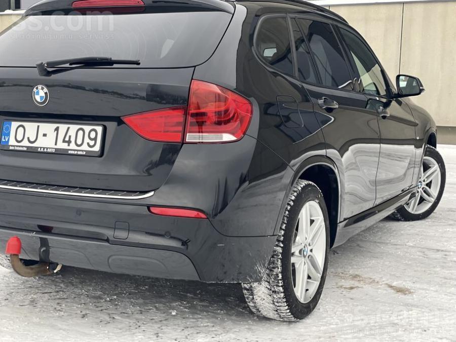 Black BMW X1 2014 in Riga, with an engine capacity of 2.00 L and mileage of 199 thousand km for 12690 €, photo 8 on AUTOMOTO.COM.LV