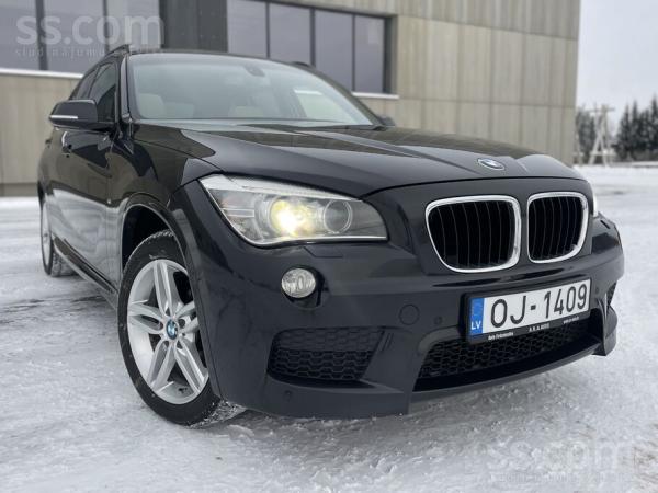 Black BMW X1 2014 in Riga, with an engine capacity of 2.00 L and mileage of 199 thousand km for 12690 €, photo 9 on AUTOMOTO.COM.LV