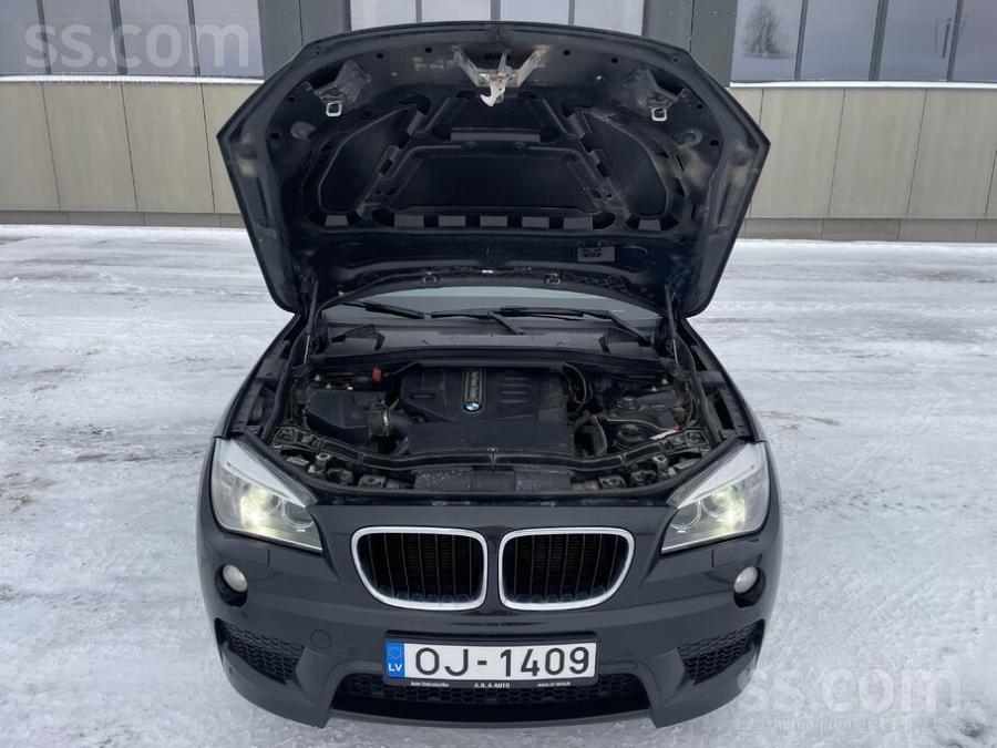 Black BMW X1 2014 in Riga, with an engine capacity of 2.00 L and mileage of 199 thousand km for 12690 €, photo 13 on AUTOMOTO.COM.LV