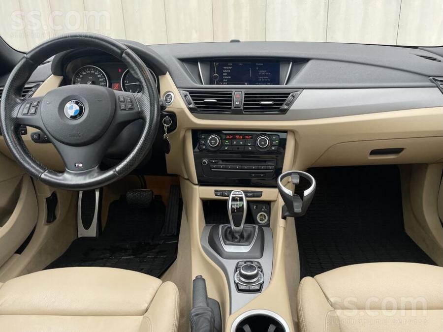 Black BMW X1 2014 in Riga, with an engine capacity of 2.00 L and mileage of 199 thousand km for 12690 €, photo 17 on AUTOMOTO.COM.LV