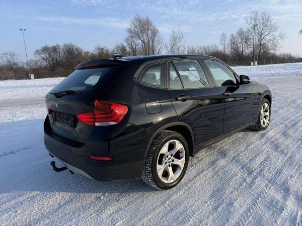 Black BMW X1 2014 in Marijampole, with an engine capacity of 2.00 L and mileage of 210 thousand km for 4850 €, photo 3 on AUTOMOTO.COM.LV