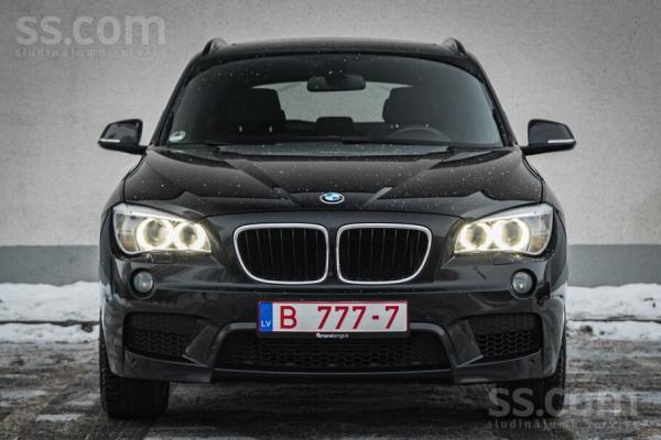 Black BMW X1 2014 in Riga, with an engine capacity of 2.00 L and mileage of 0 thousand km for 13750 €, photo 2 on AUTOMOTO.COM.LV