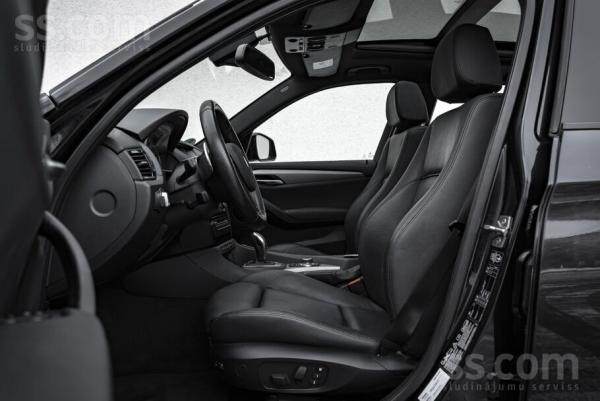 Black BMW X1 2014 in Riga, with an engine capacity of 2.00 L and mileage of 0 thousand km for 13750 €, photo 8 on AUTOMOTO.COM.LV