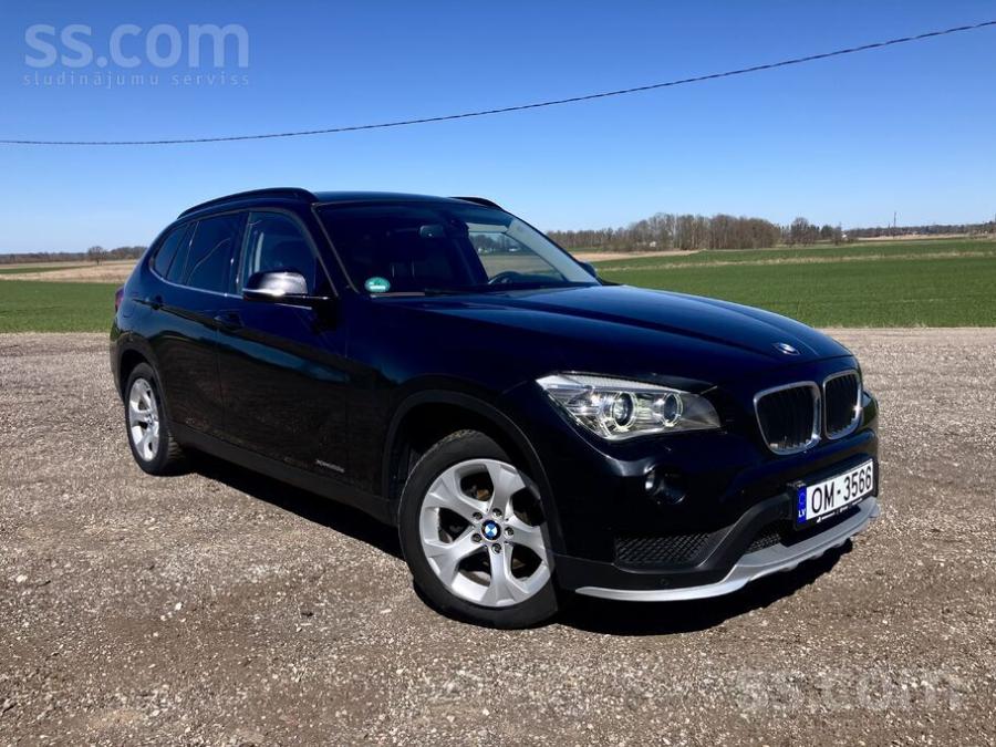 Black BMW X1 2014 in Talsi, with an engine capacity of 2.00 L and mileage of 181 thousand km for 11999 €, photo 1 on AUTOMOTO.COM.LV