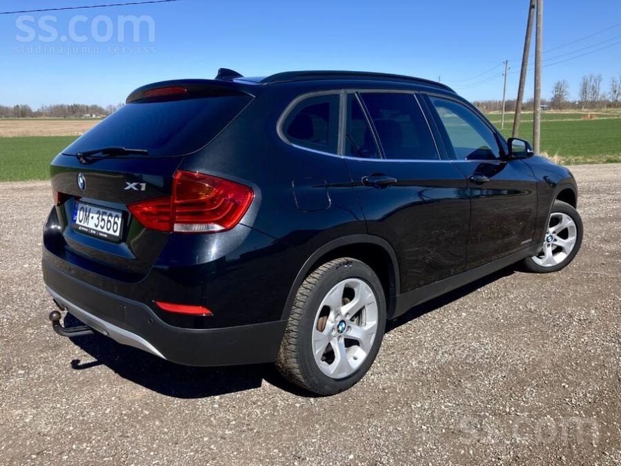 Black BMW X1 2014 in Talsi, with an engine capacity of 2.00 L and mileage of 181 thousand km for 11999 €, photo 4 on AUTOMOTO.COM.LV