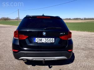 Black BMW X1 2014 in Talsi, with an engine capacity of 2.00 L and mileage of 181 thousand km for 11999 €, photo 5 on AUTOMOTO.COM.LV