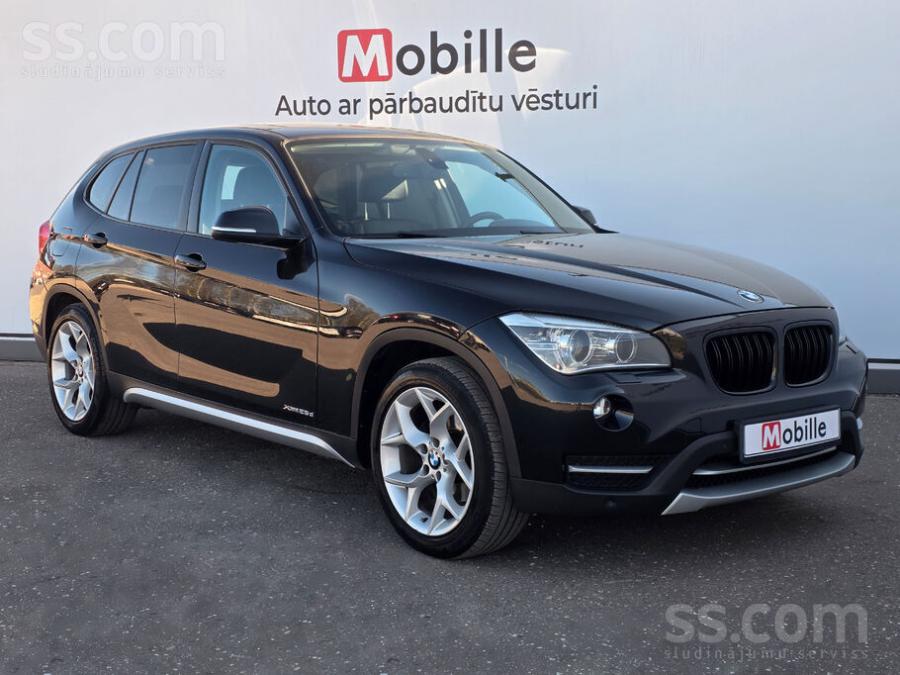 Black BMW X1 2014 in Riga, with an engine capacity of 2.00 L and mileage of 269 thousand km for 10700 €, photo 1 on AUTOMOTO.COM.LV