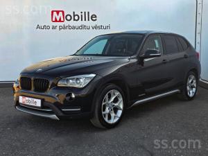 Black BMW X1 2014 in Riga, with an engine capacity of 2.00 L and mileage of 269 thousand km for 10700 €, photo 4 on AUTOMOTO.COM.LV